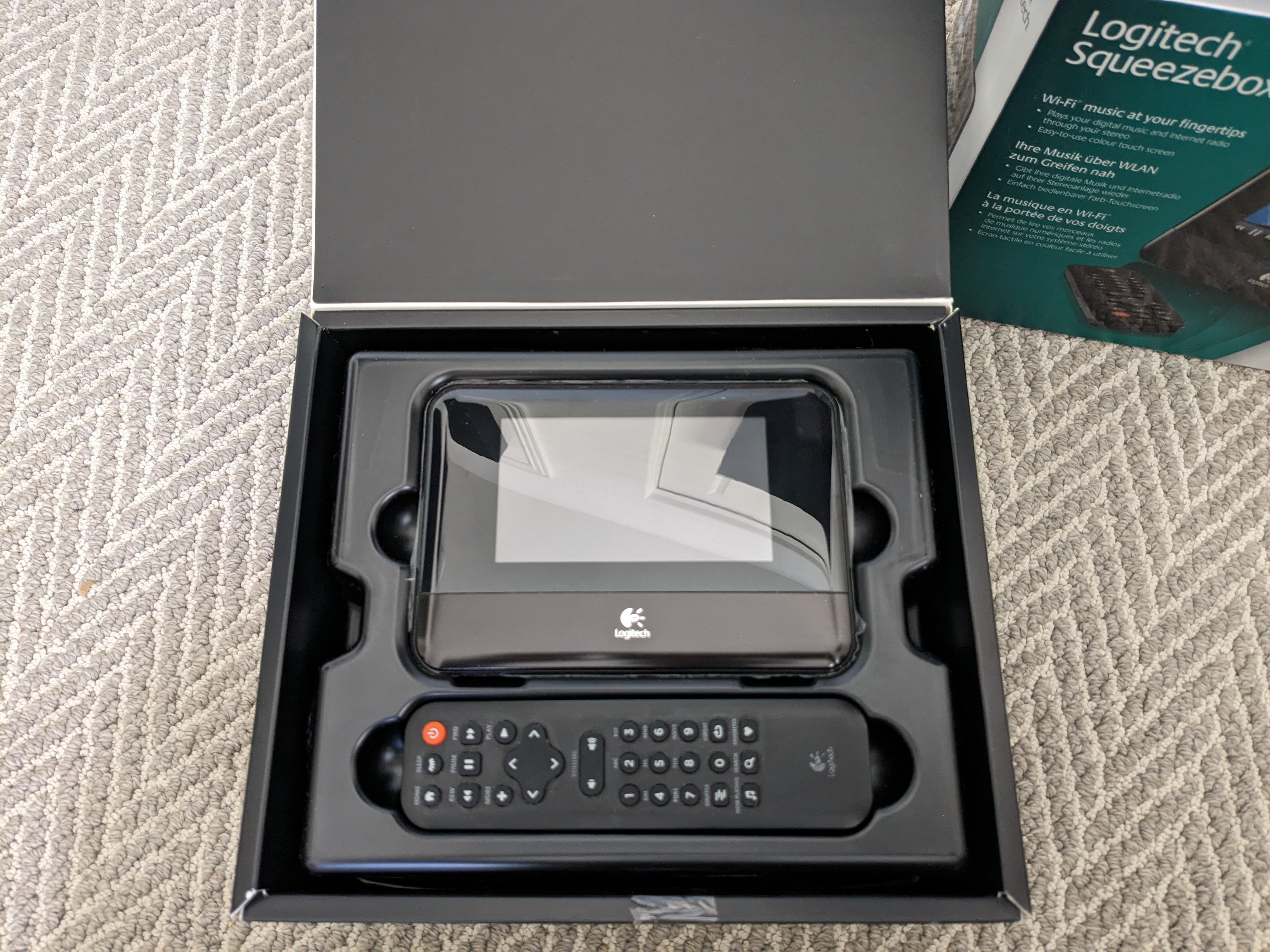 Sold: Logitech Squeezebox Touch Streamer Wi-Fi Music Player | Headphone ...